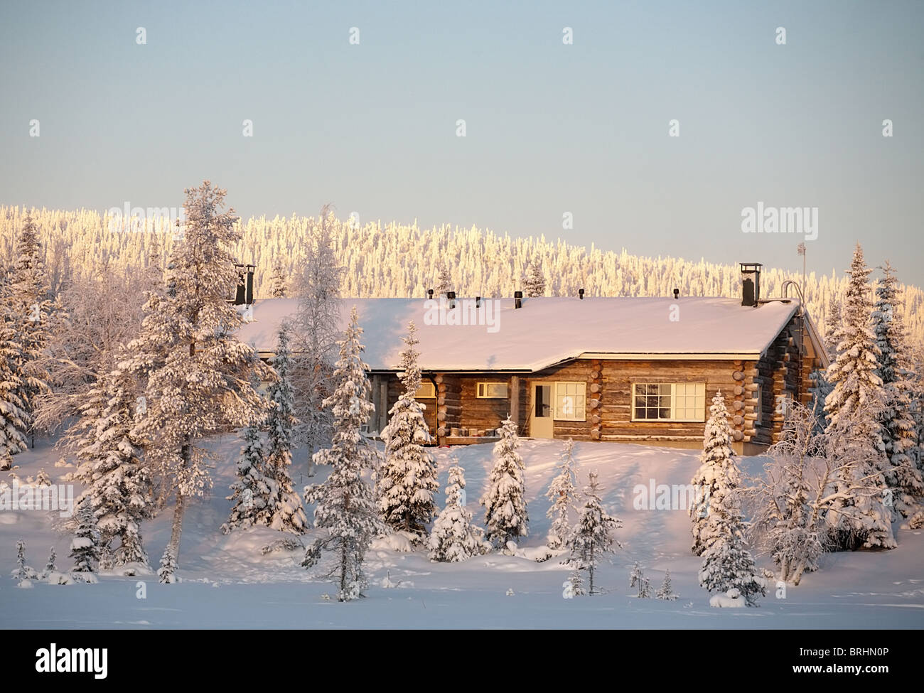 wooden cottage in snow forest Stock Photo - Alamy