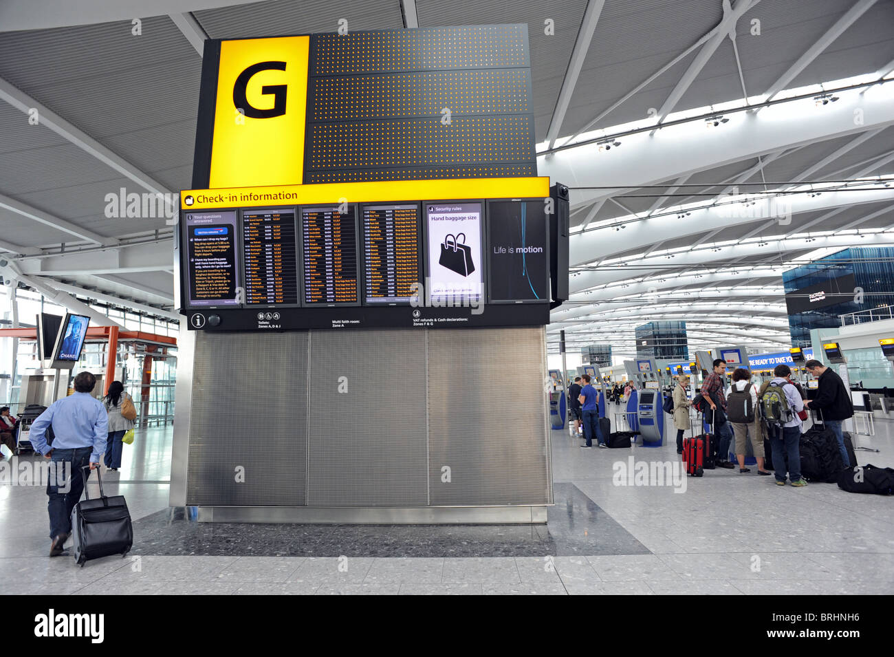 One of the check in areas inside Heathrow terminal 5 Stock Photo - Alamy