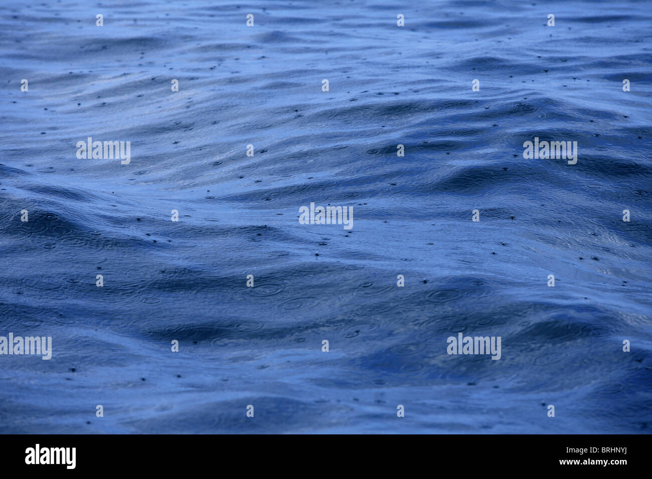 Rain falling on ocean waves hi-res stock photography and images - Alamy
