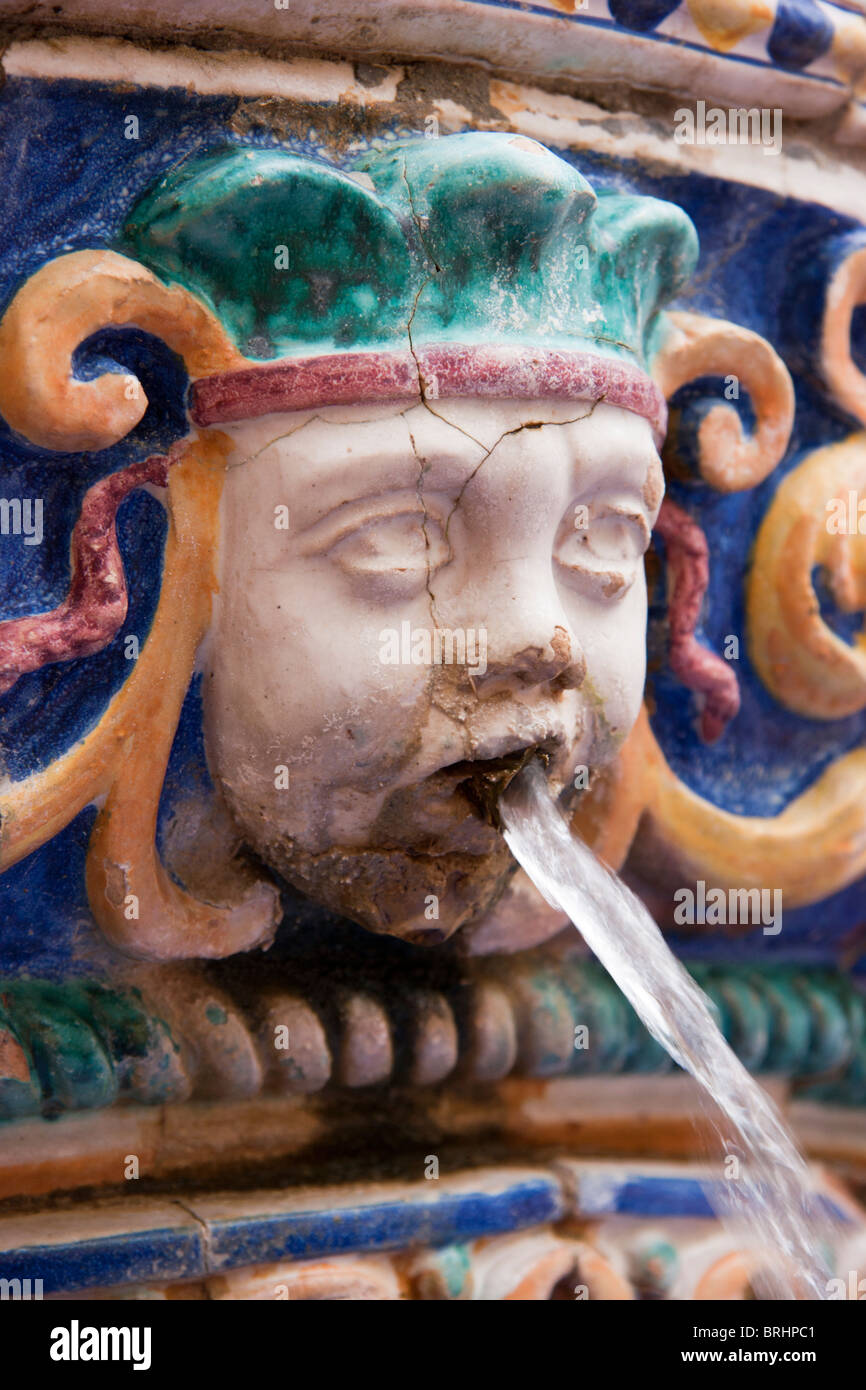 painted fountain in face shape spanish Stock Photo - Alamy