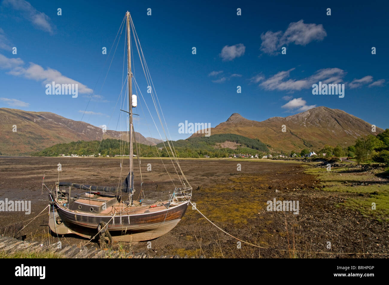 High and Dry, Yacht at low tide on Loch Leven, Ballachulish, Glencoe ...