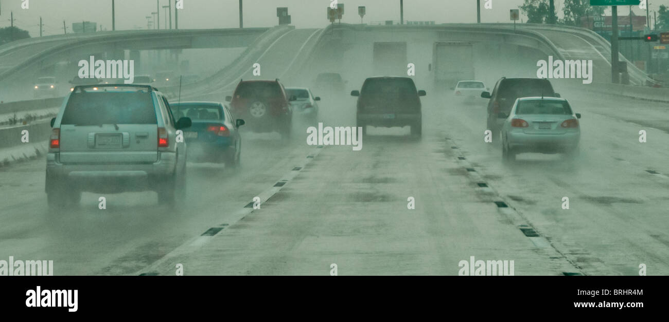 Freeway traffic during torrential rain storm in Houston, Texas, USA ...