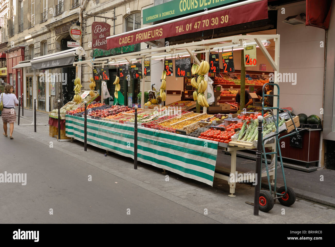 Market vegetable stall outdoors on a street in Paris Stock Photo - Alamy