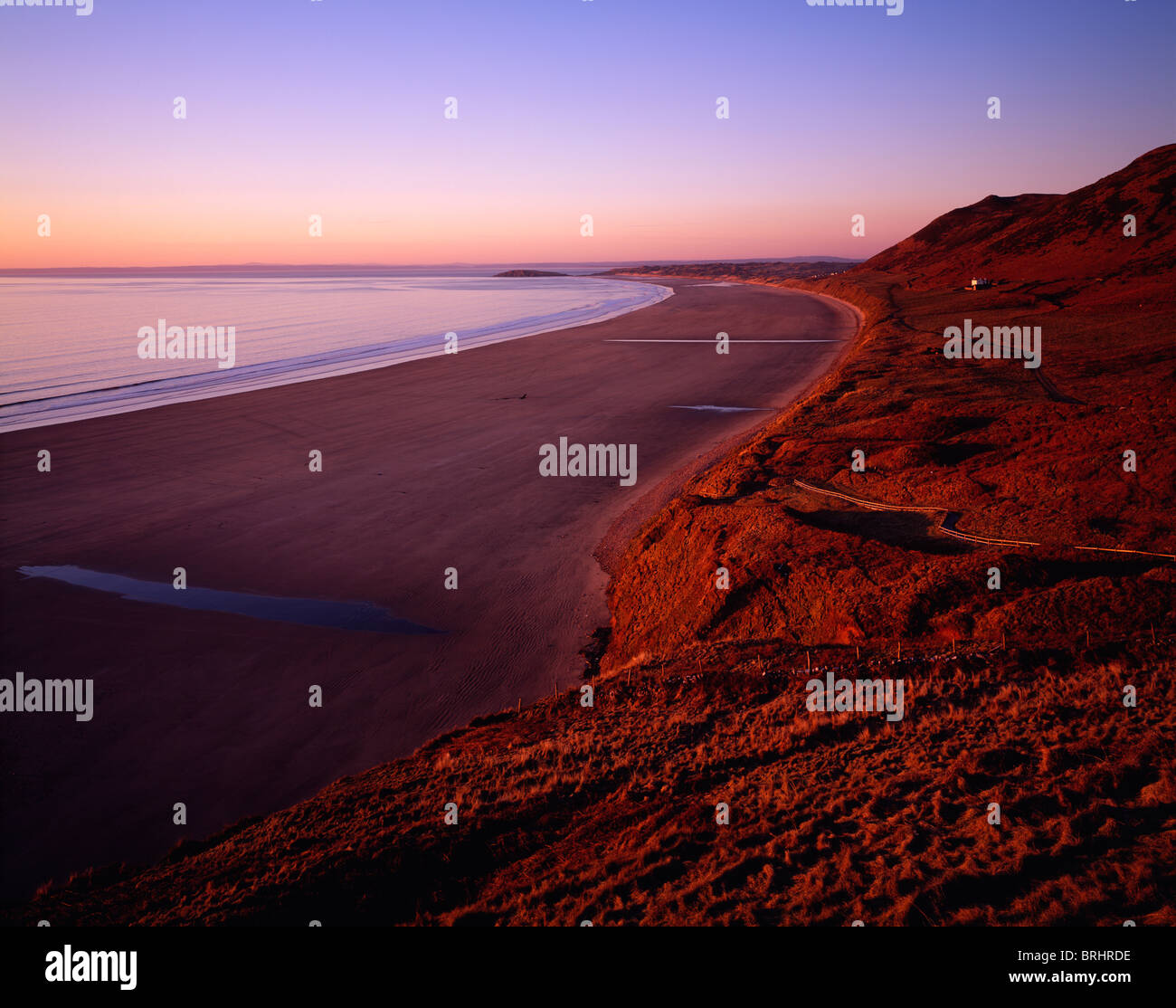 Sunset at Rhossili Bay and Rhossili Down on the Gower Peninsular ...