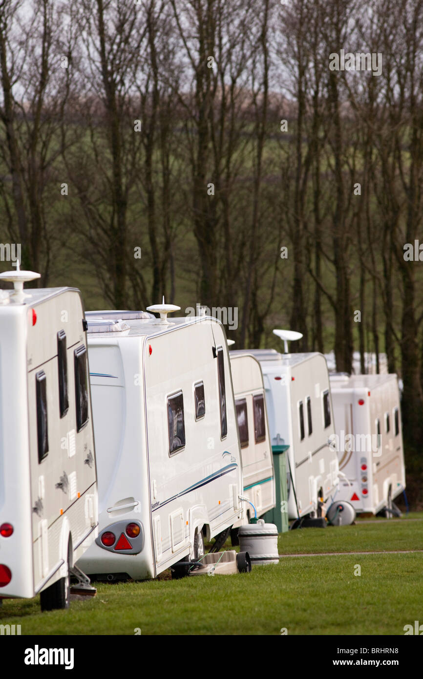 A row of caravans on a UK campsite in the summer, Dorset, UK Stock ...
