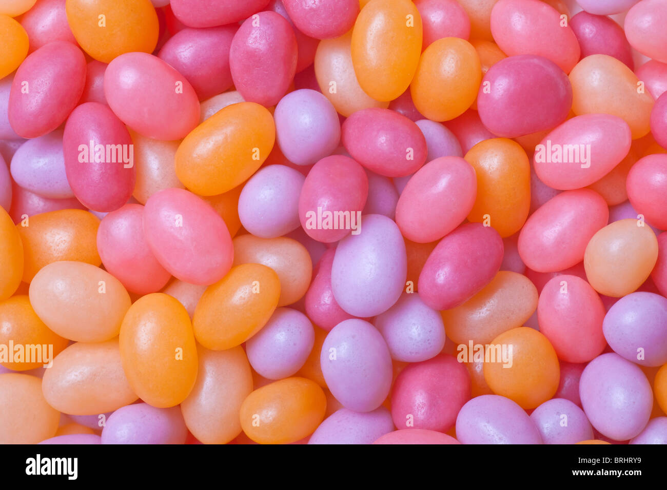 jelly beans multi colored backdrop or background Stock Photo - Alamy
