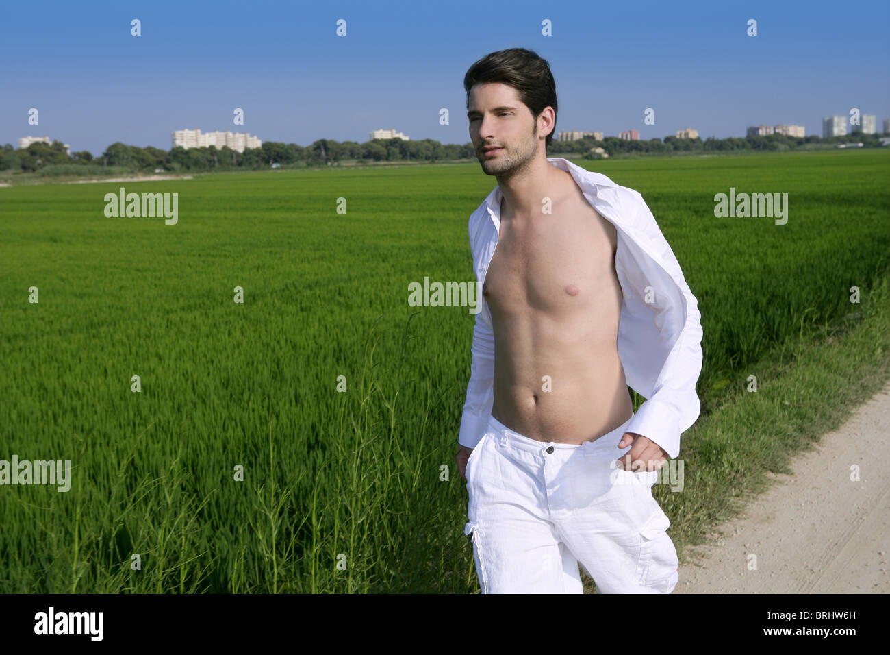 Boy running in rice field hi-res stock photography and images - Alamy