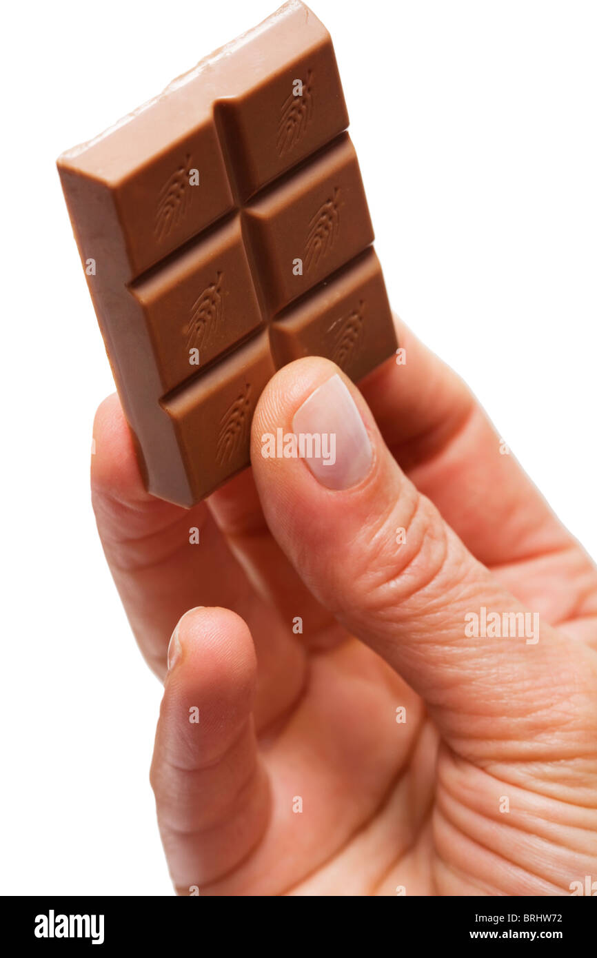 hand holding chocolate Stock Photo - Alamy