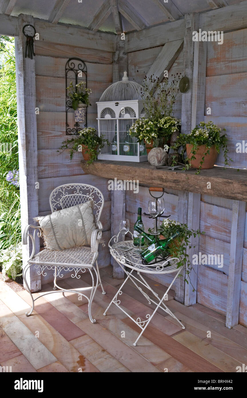 Decorated interior of a smart urban garden shed with seating Stock ...
