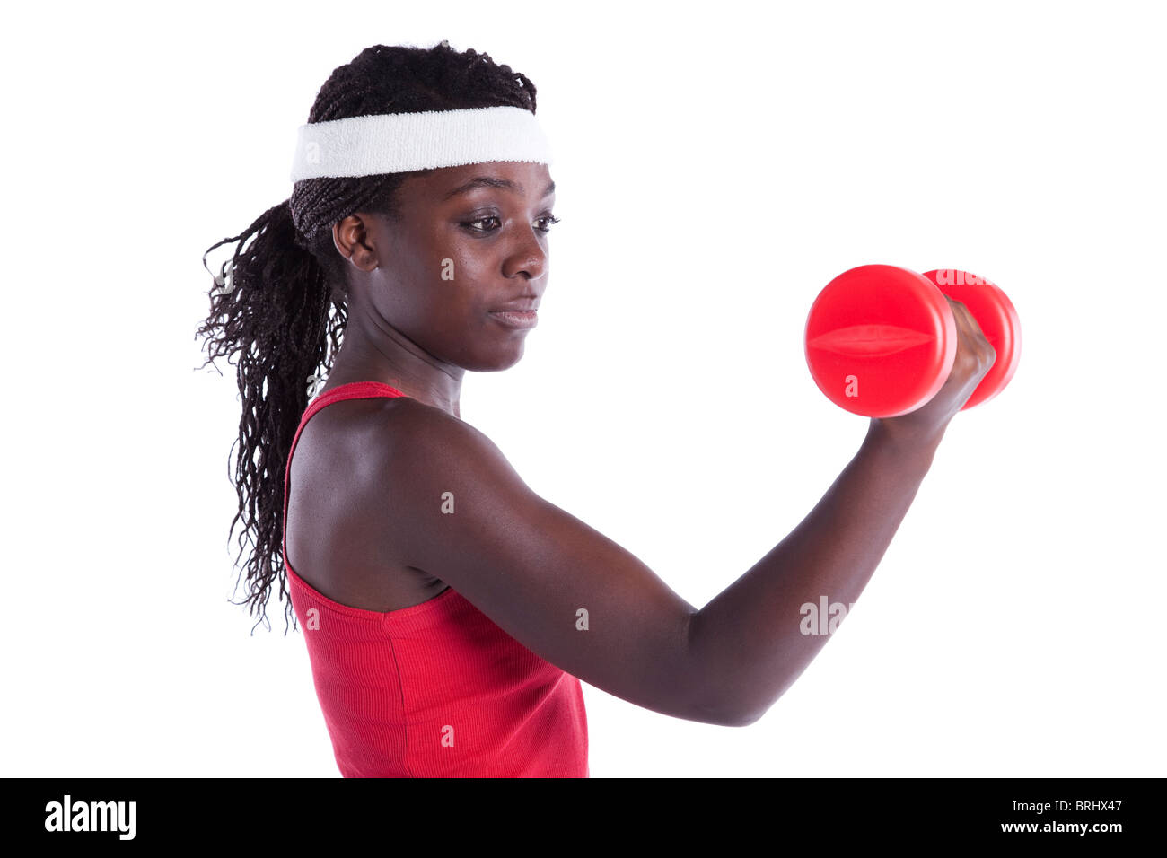african young woman exercising her muscle with dumbbell (isolated on ...