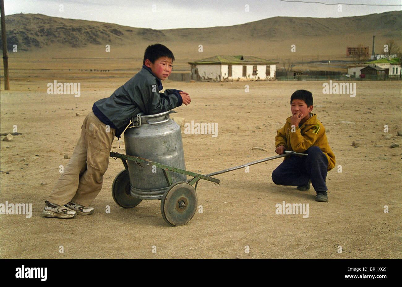 kids carrying water Mongolia mongolie Mongolie traditional dress native ...
