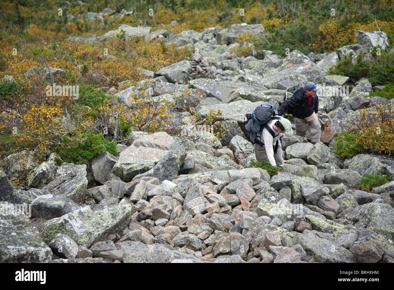 Hikers ascending King Ravine Trail. Located in King Ravine in the White ...