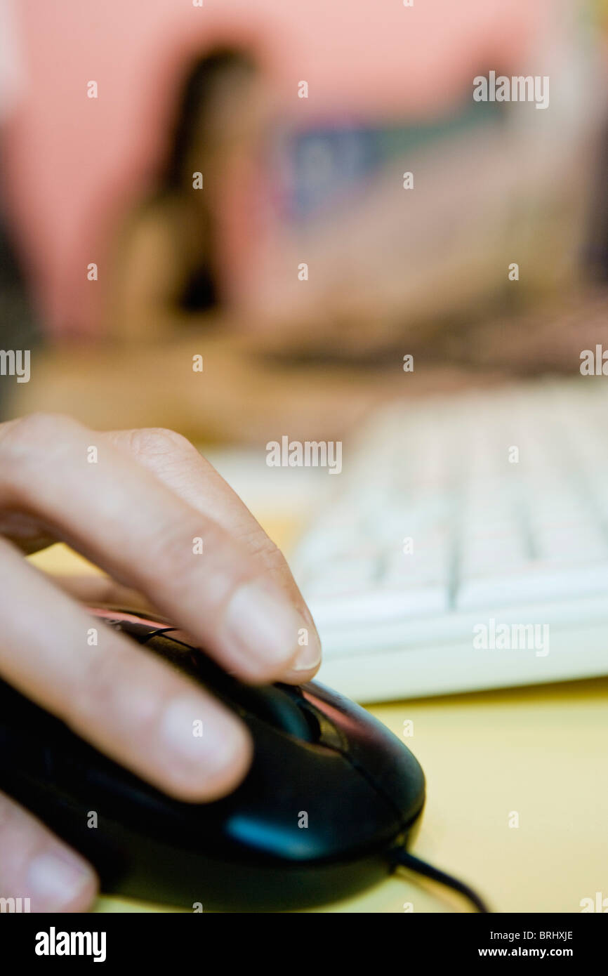 Person using computer mouse, cropped Stock Photo - Alamy