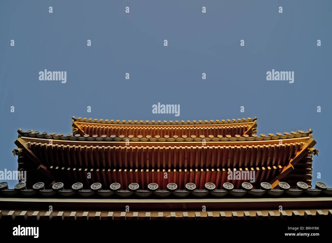 A look up at a Japanese temple pagoda and a blue sky Stock Photo - Alamy