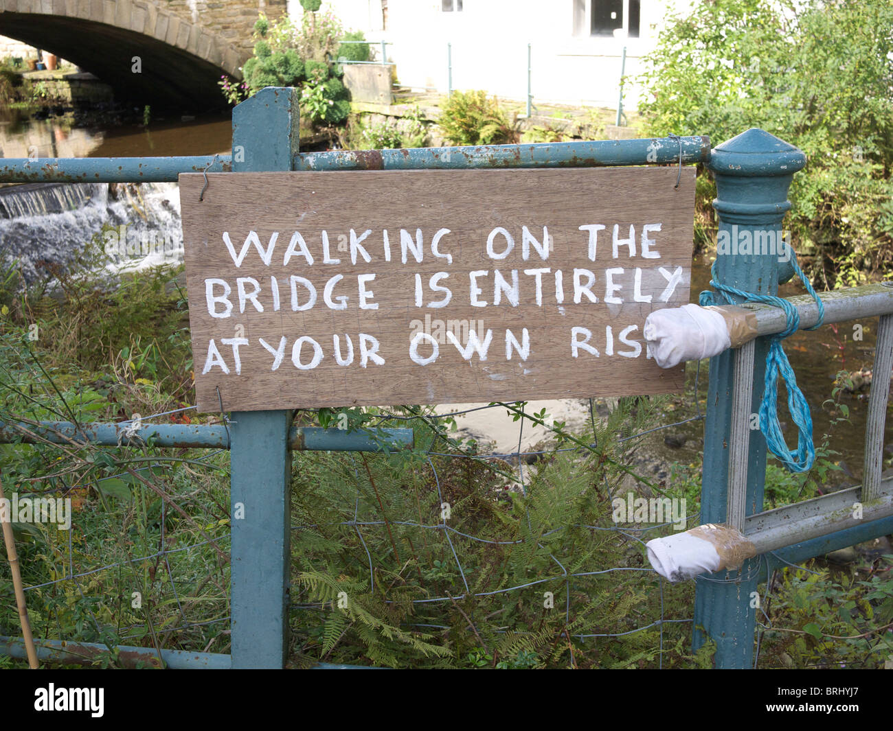 Warning sign on old bridge, Delph village, Saddleworth, England, UK ...