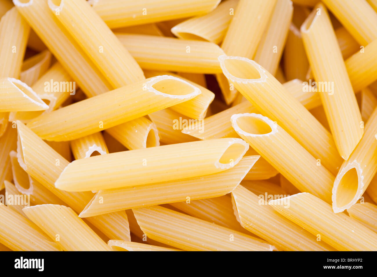 Dried penne pasta Stock Photo - Alamy