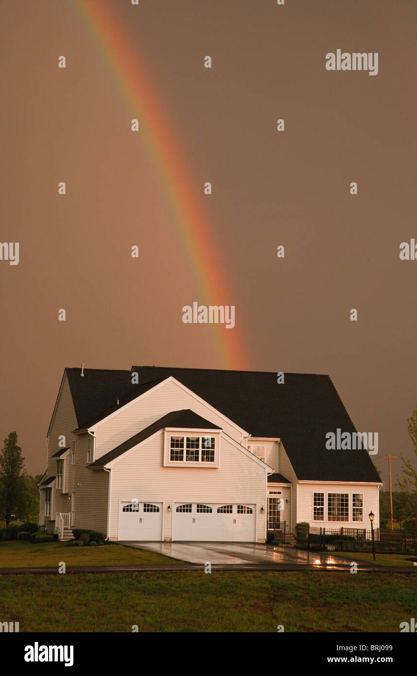 rainbow over house Stock Photo - Alamy
