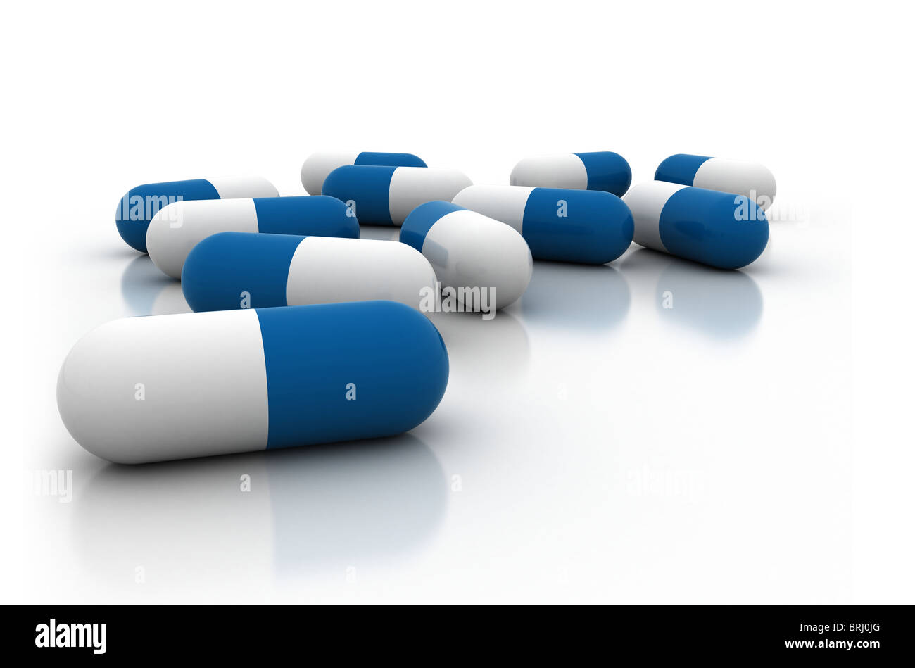 Medical illustration - blue pills on white background Stock Photo - Alamy