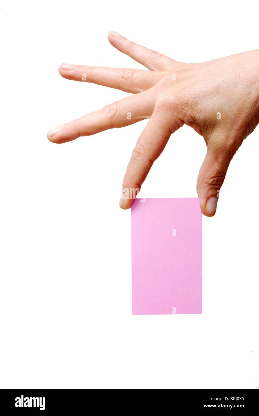 hand holding a pink sheet of paper Stock Photo - Alamy