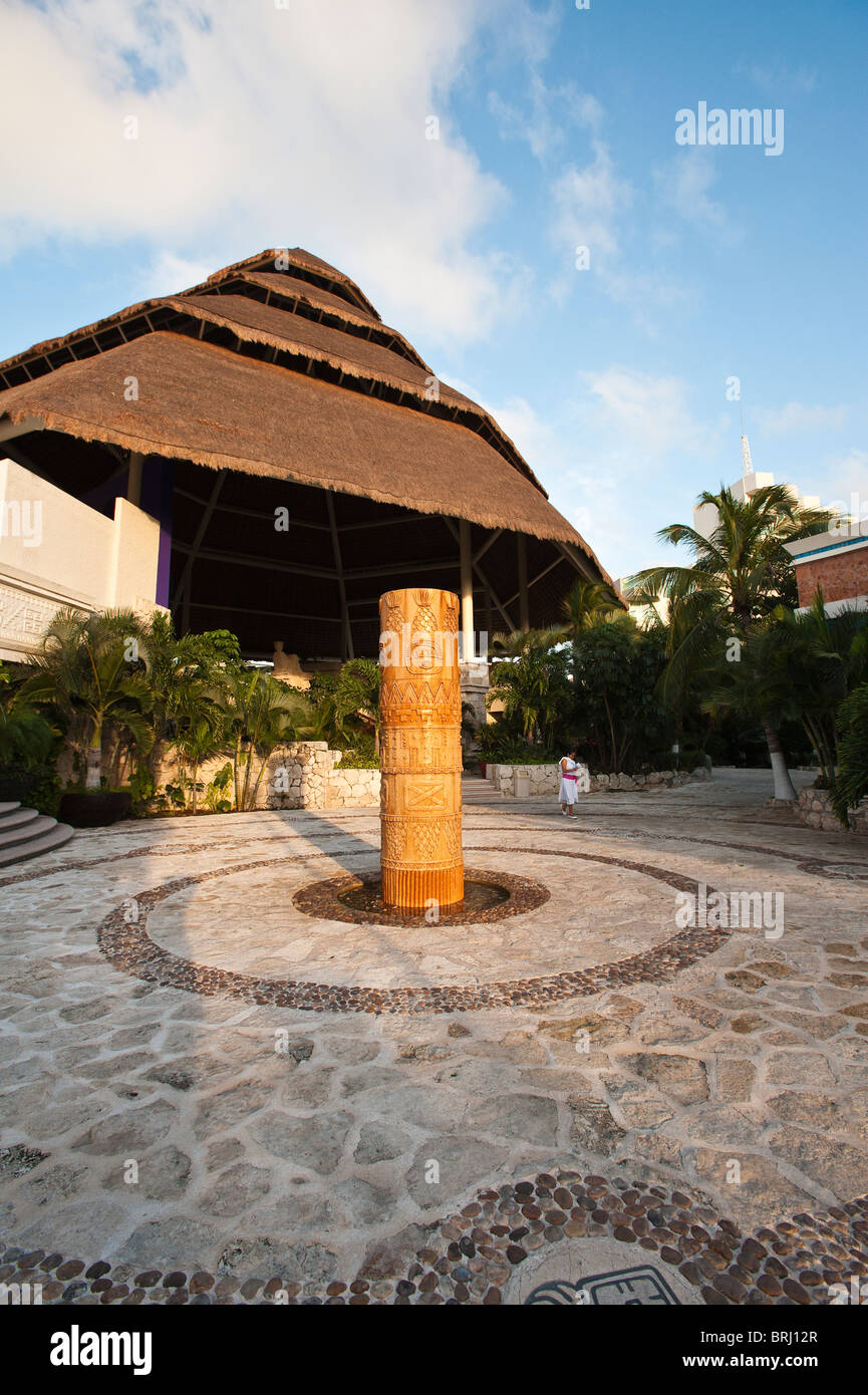 Mexico, Cozumel. Carved Maya story pole at the Park Royal Hotel Isla de ...
