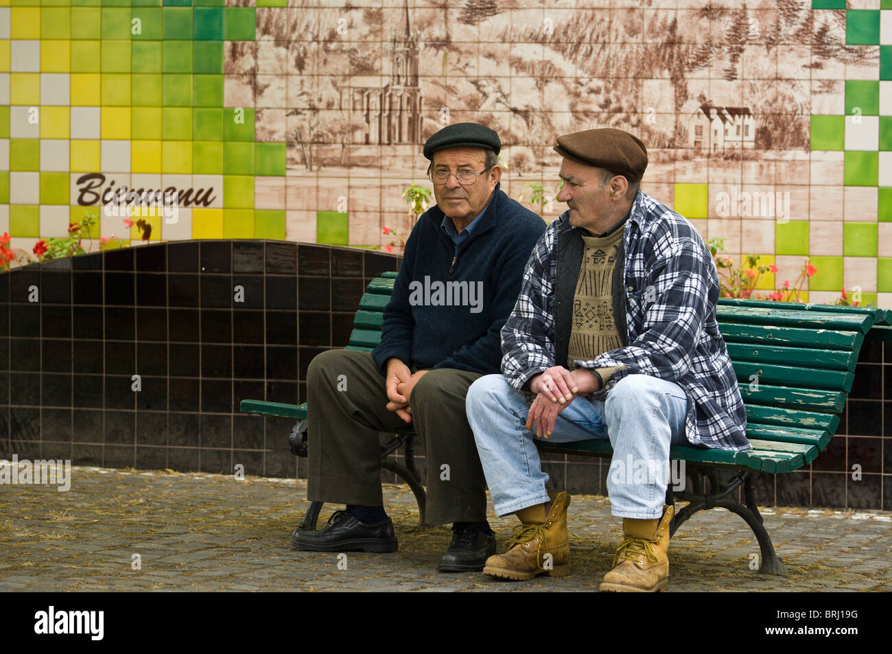 Men sitting on bench in Furnas, San Miguel, Azores, Portugal Stock ...