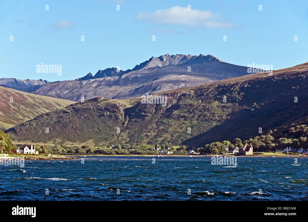 View from Loch Ranza towards Lochranza Castle (right) with Arran hills ...