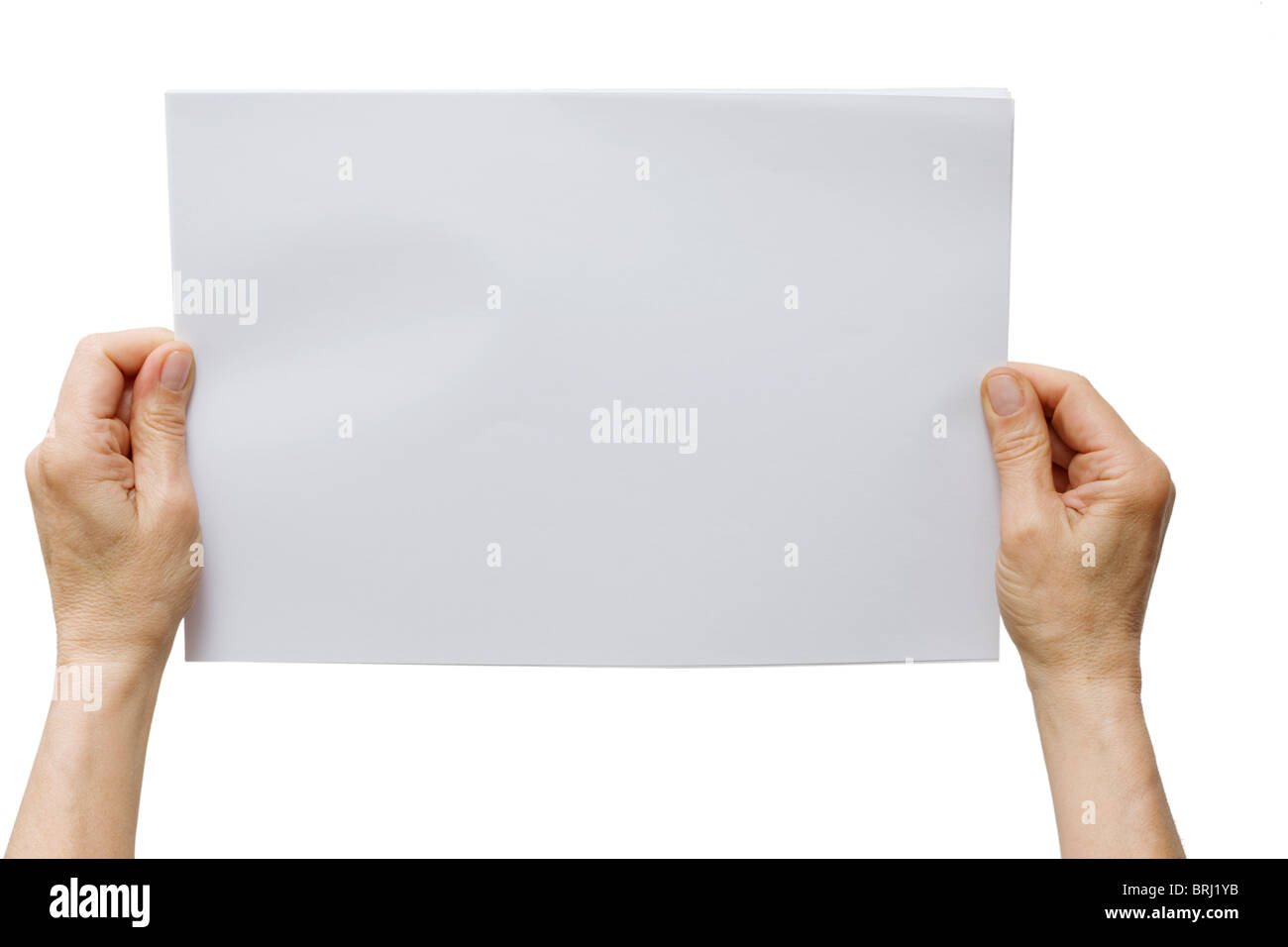 hands holding a white sheet of paper Stock Photo - Alamy