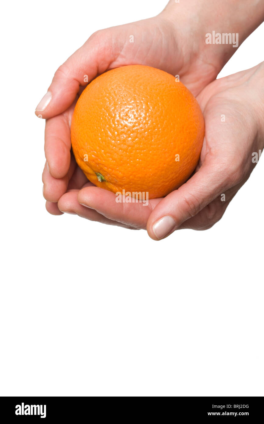 orange in the hands Stock Photo - Alamy