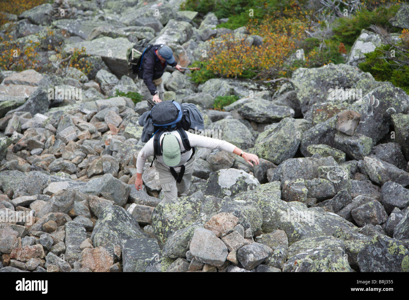 Hikers ascending King Ravine Trail. Located in King Ravine in the White ...
