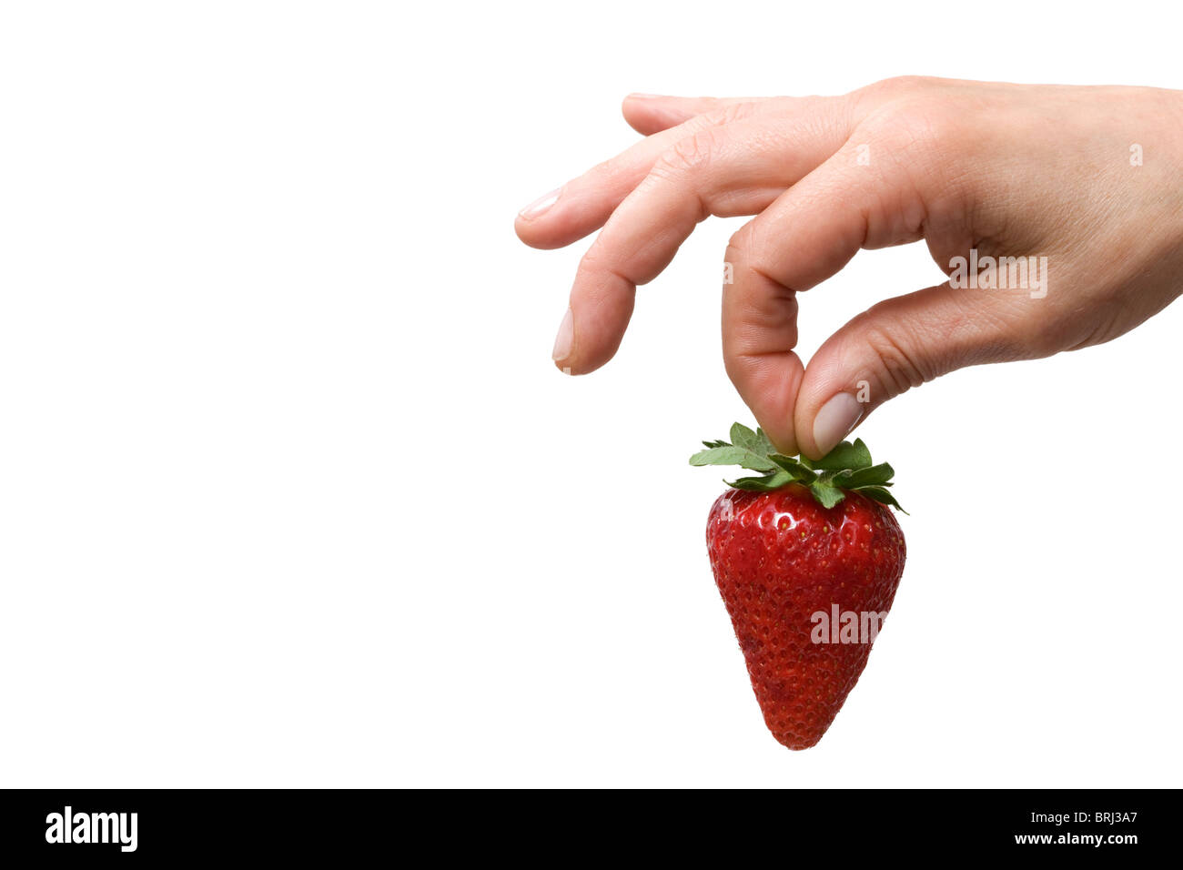 hand holding a strawberry Stock Photo - Alamy