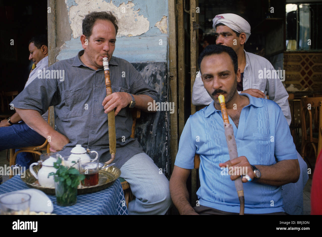 Egyptians smoking from water pipes in Cairo, Egypt Stock Photo - Alamy