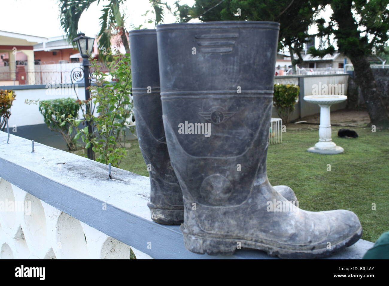 Red plastic boots hi-res stock photography and images - Alamy