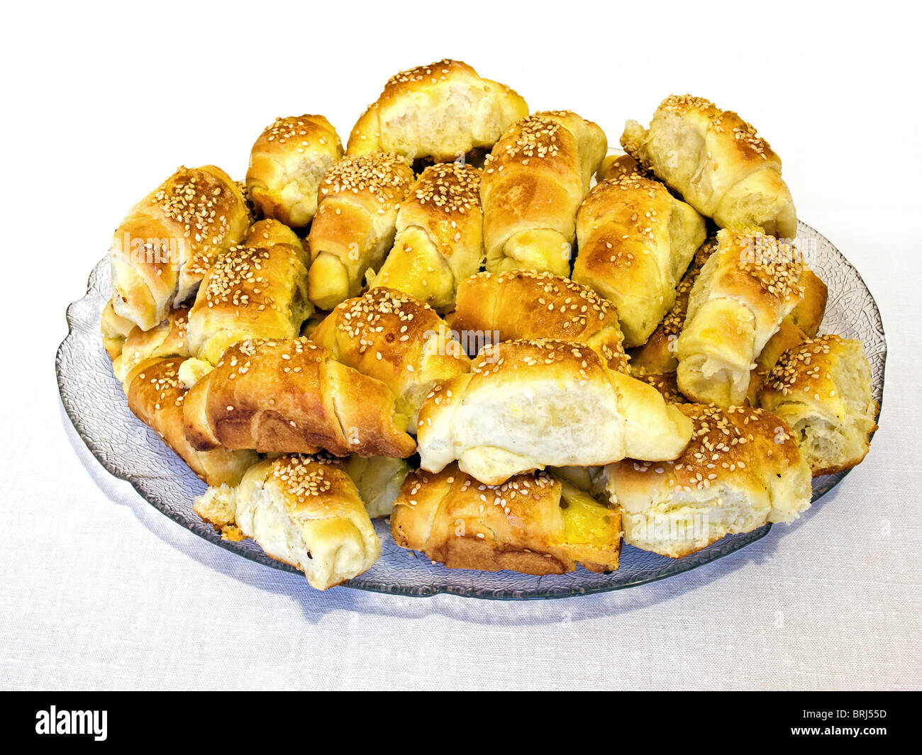 Lot of salty croissants with cheese and sesame Stock Photo - Alamy