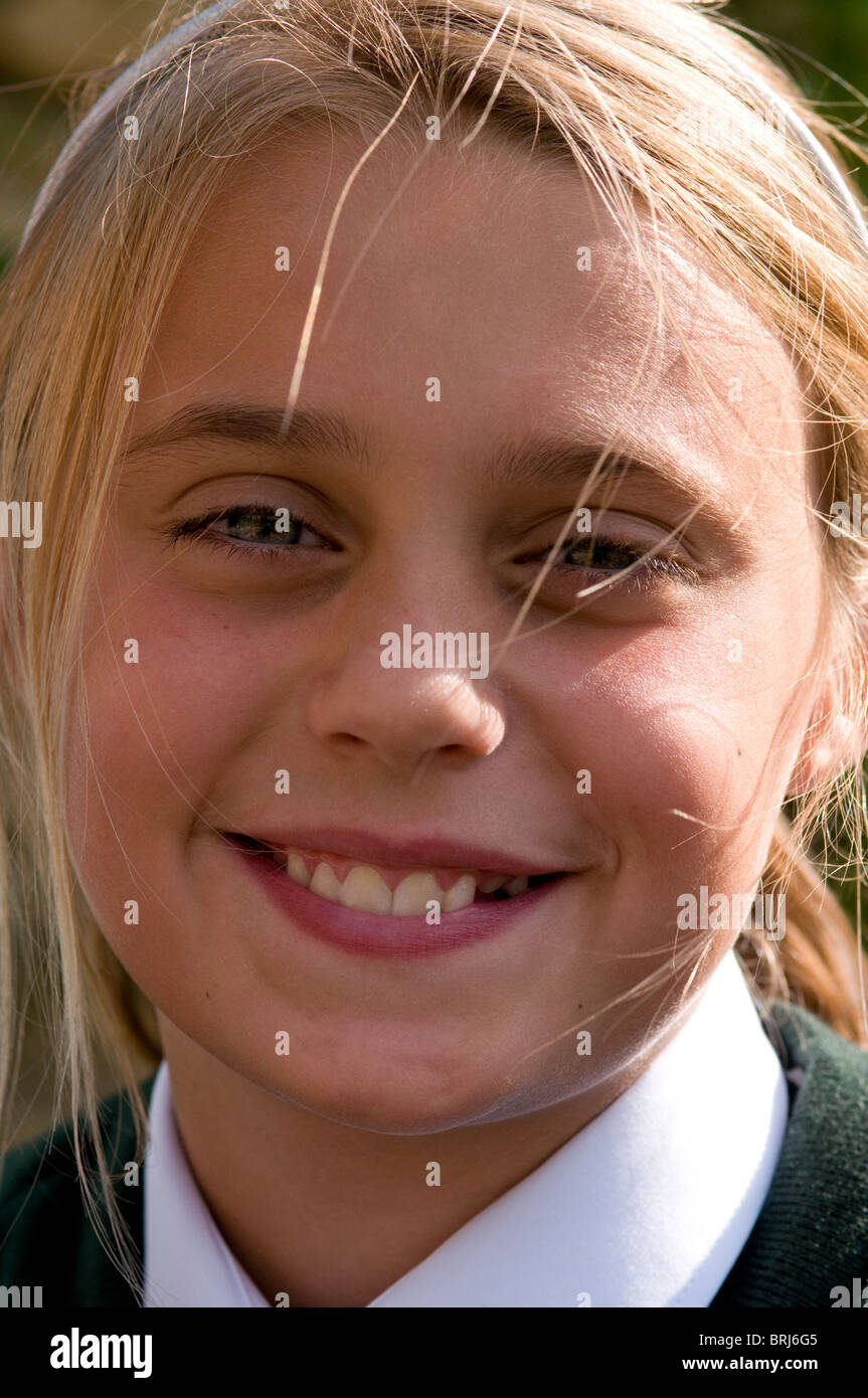 Portrait of a smiling happy schoolgirl Stock Photo - Alamy