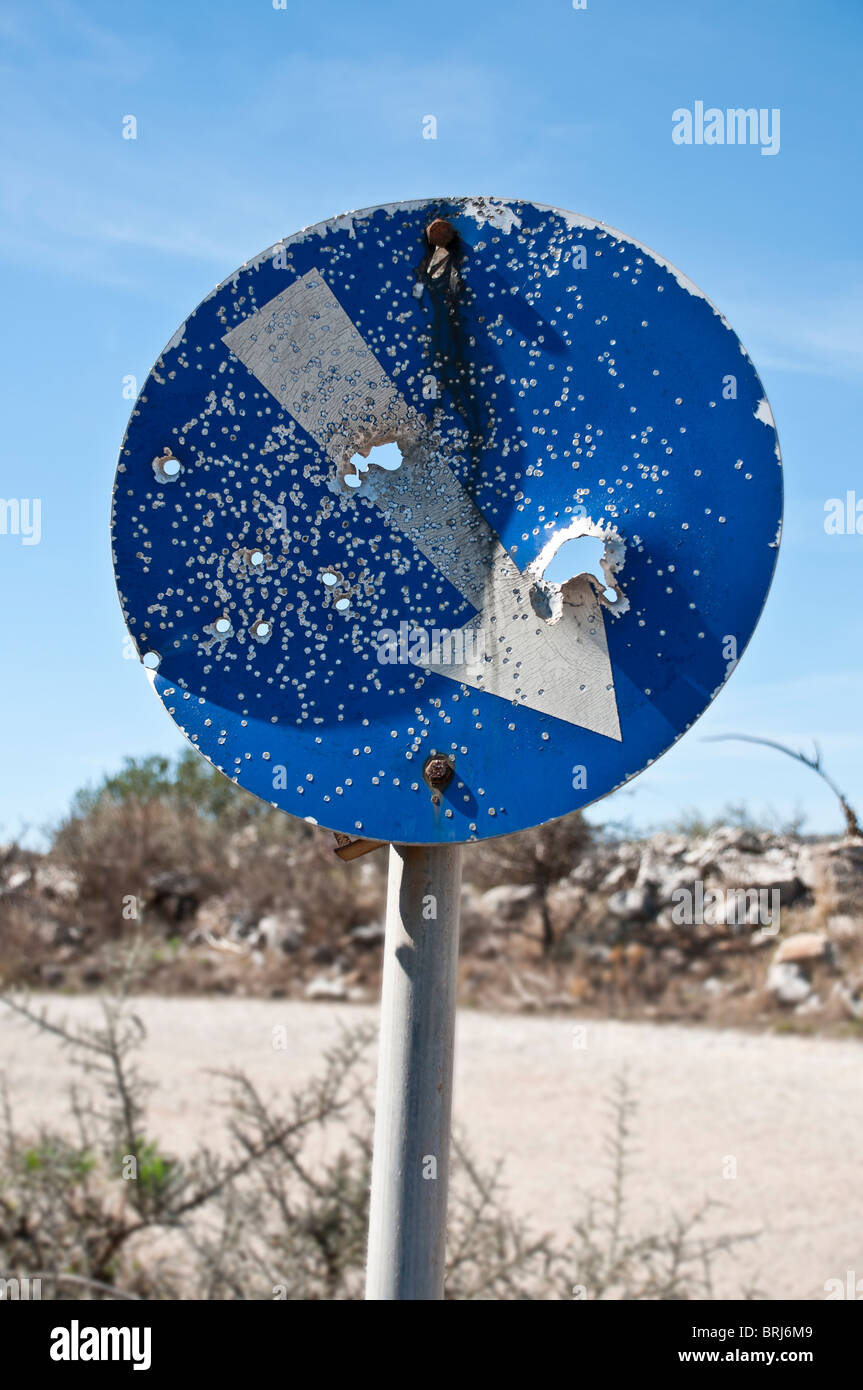 Bullet holes in road sign hi-res stock photography and images - Alamy