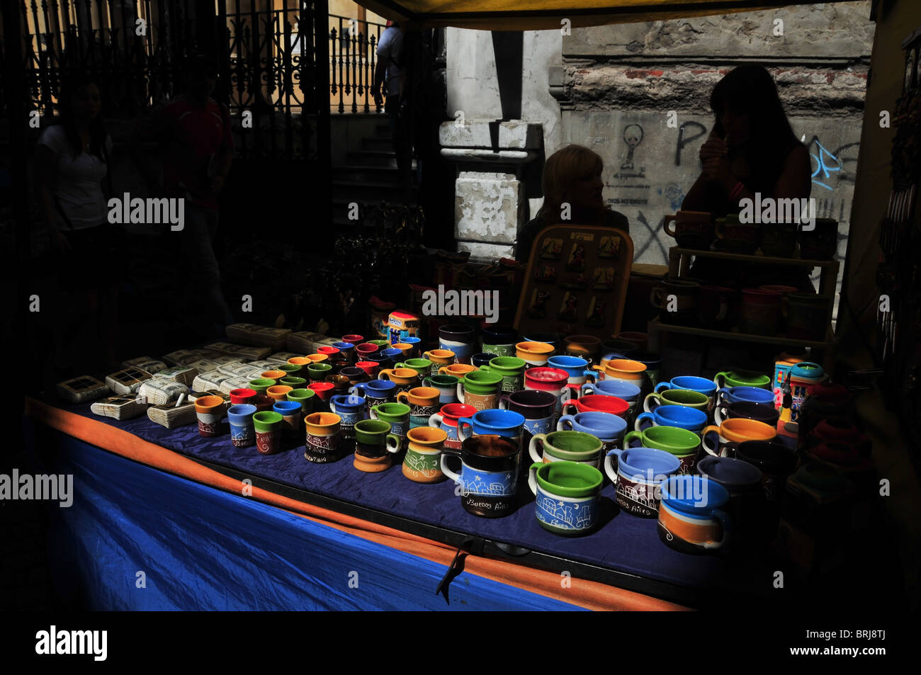 Two women selling pottery hi-res stock photography and images - Alamy