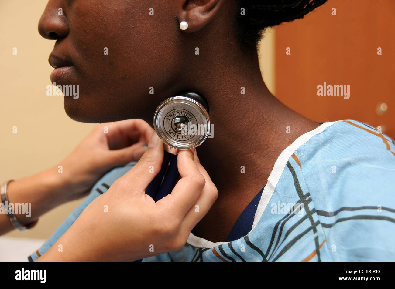 A patient undergoes a medical examination Stock Photo - Alamy