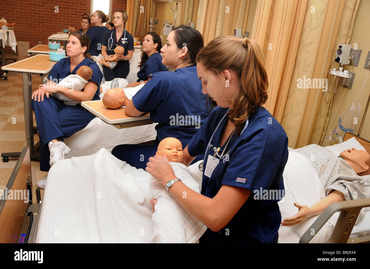 Nursing students use mannequins of newborn infants to train for medical ...