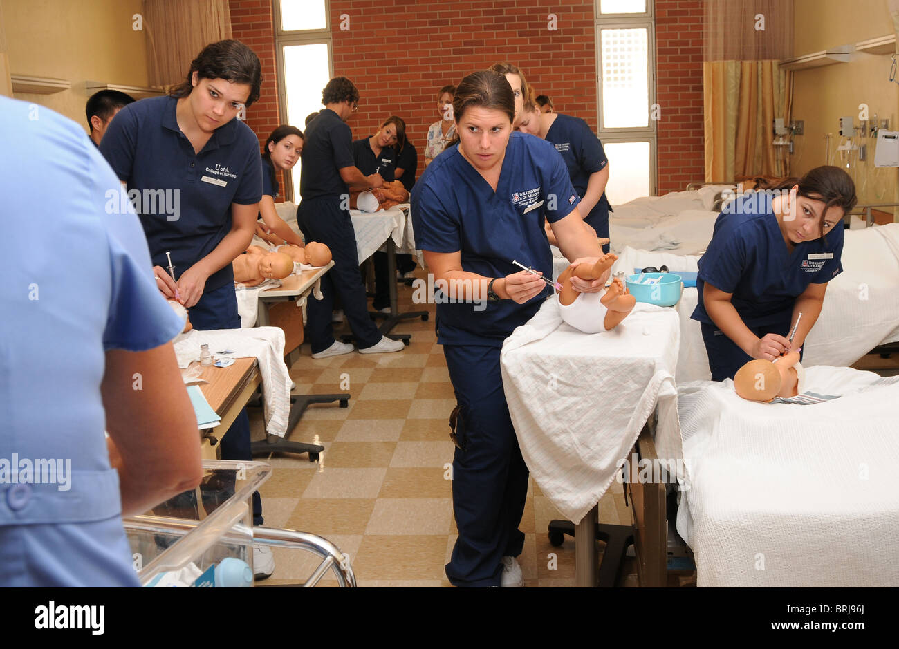 Nursing students mannequins newborn infants hi-res stock photography ...