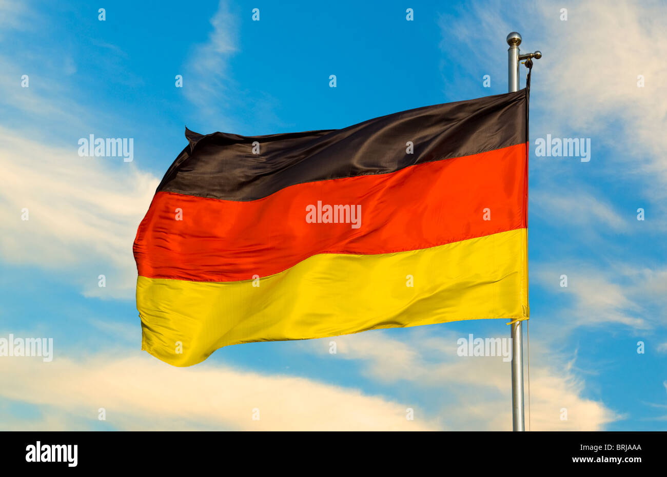 German flag on a pole hi-res stock photography and images - Alamy