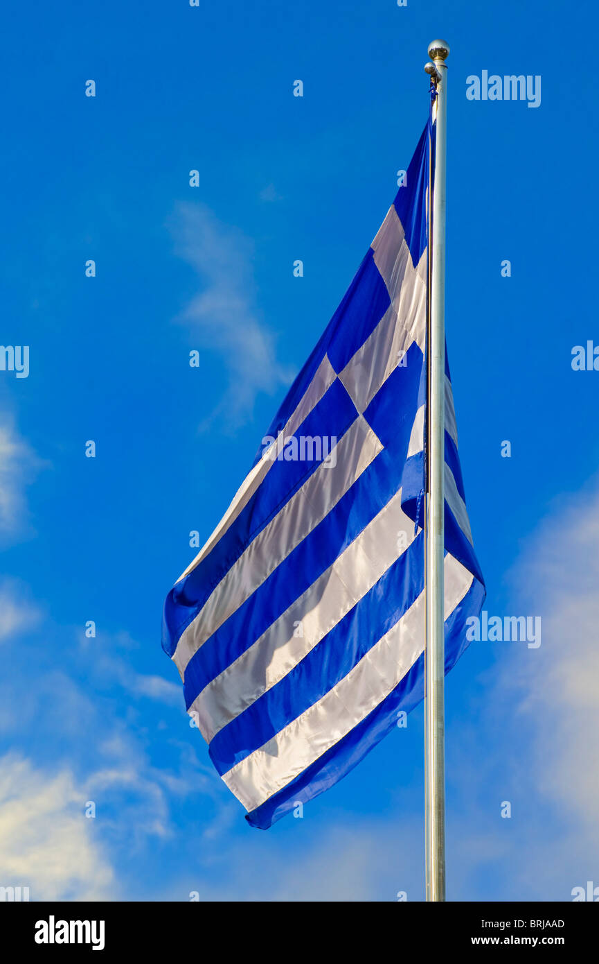 greek flag on a pole with beautiful sky Stock Photo - Alamy