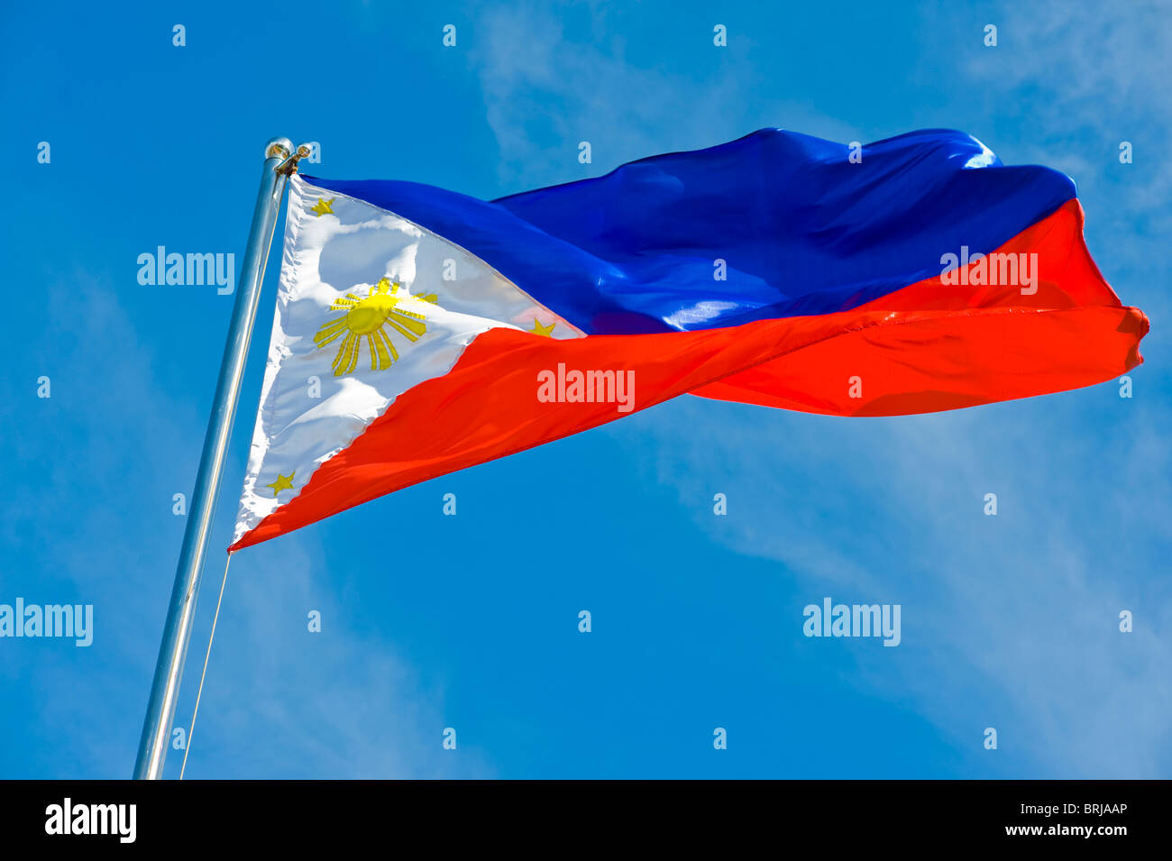 Philippines flag on flag pole hi-res stock photography and images - Alamy