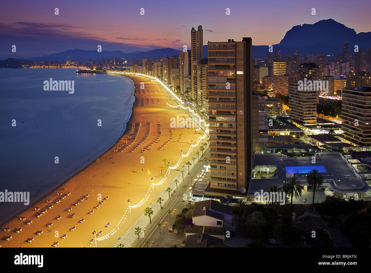Attractive panoramic view of Benidorm at night. Illuminated beaches ...