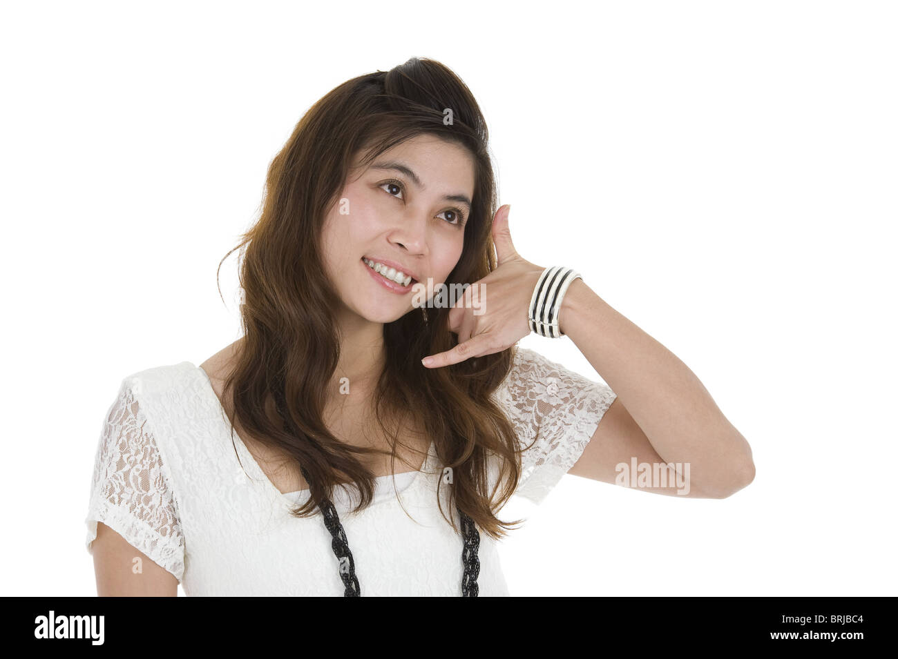 beautiful woman with a call me expression, isolated on white background ...