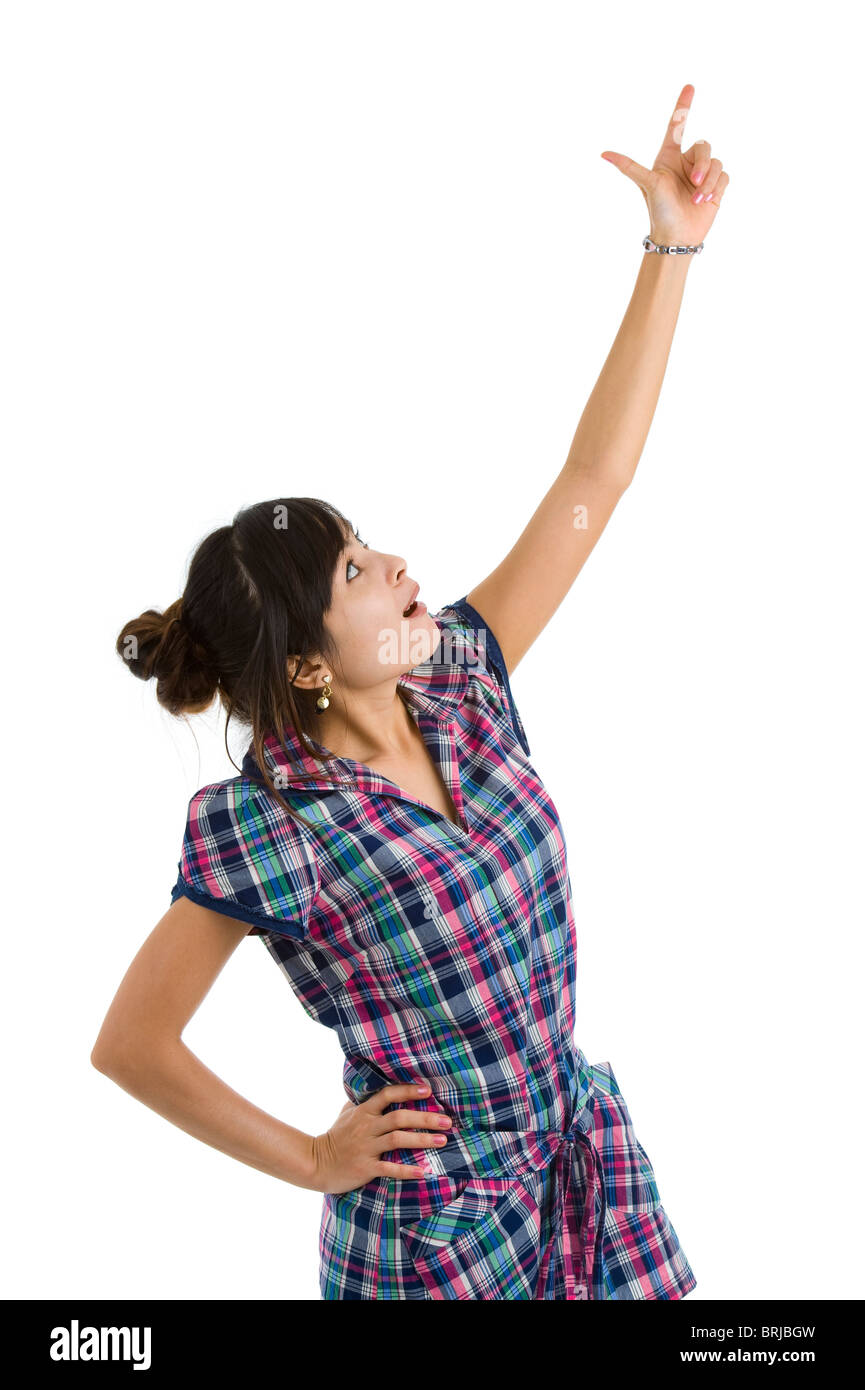beautiful woman pointing up at something, isolated on white background ...