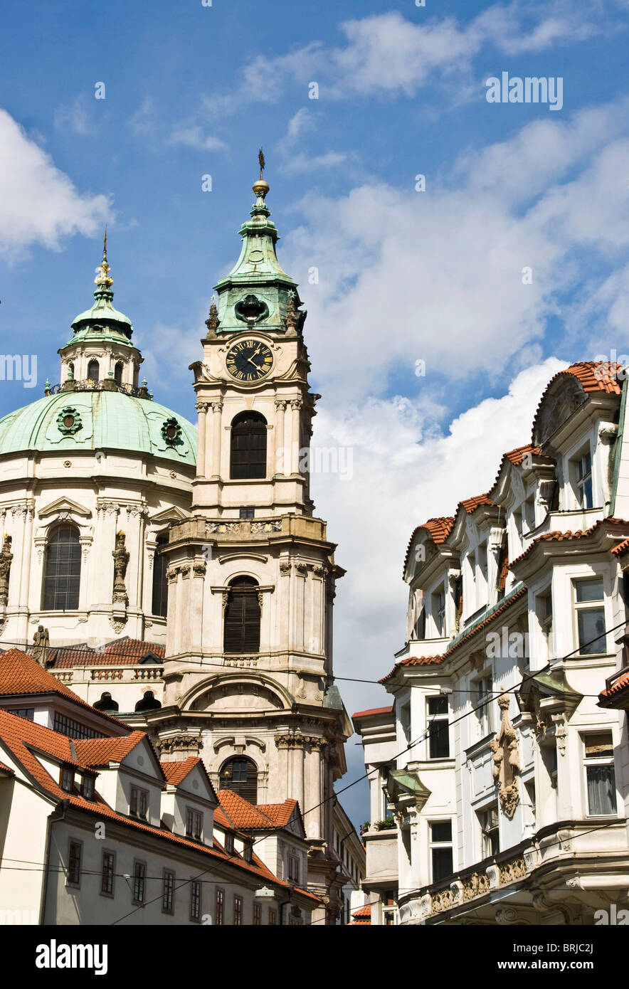 Baroque Church of St Nicholas rises above buildings of Mala Strana ...
