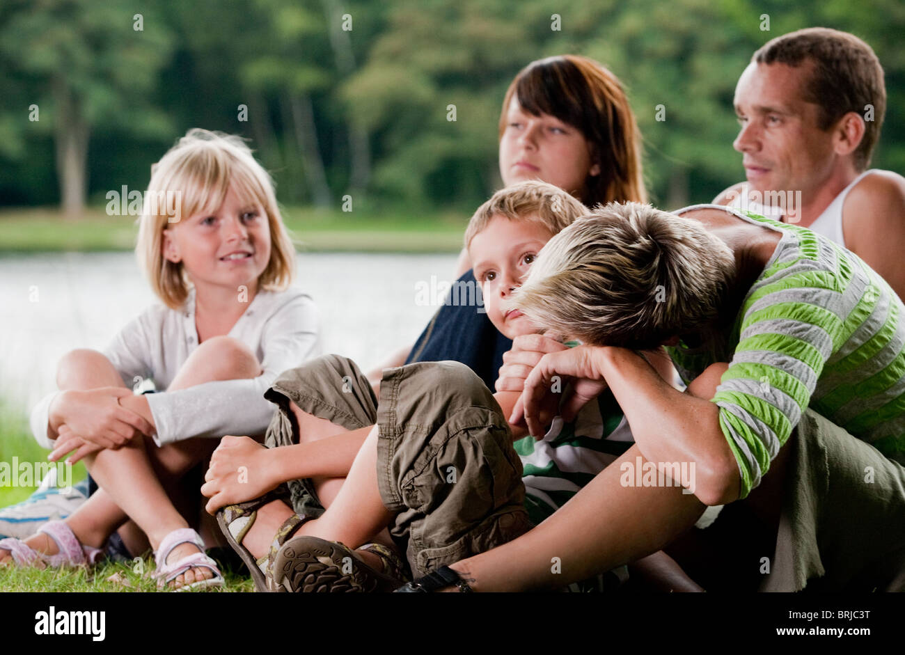 Big familys day out ion the park Stock Photo - Alamy