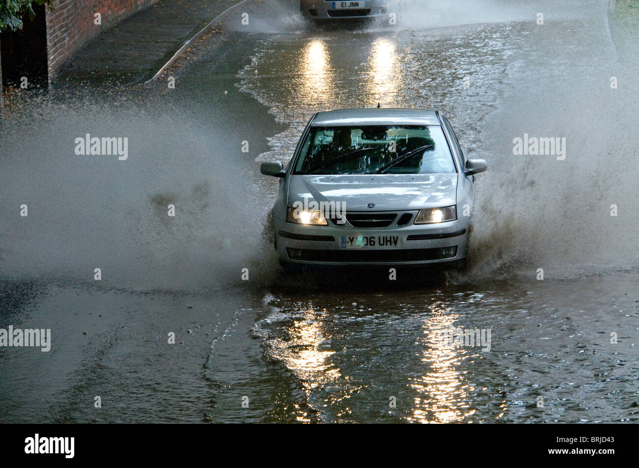 Driving through flood water Stock Photo - Alamy