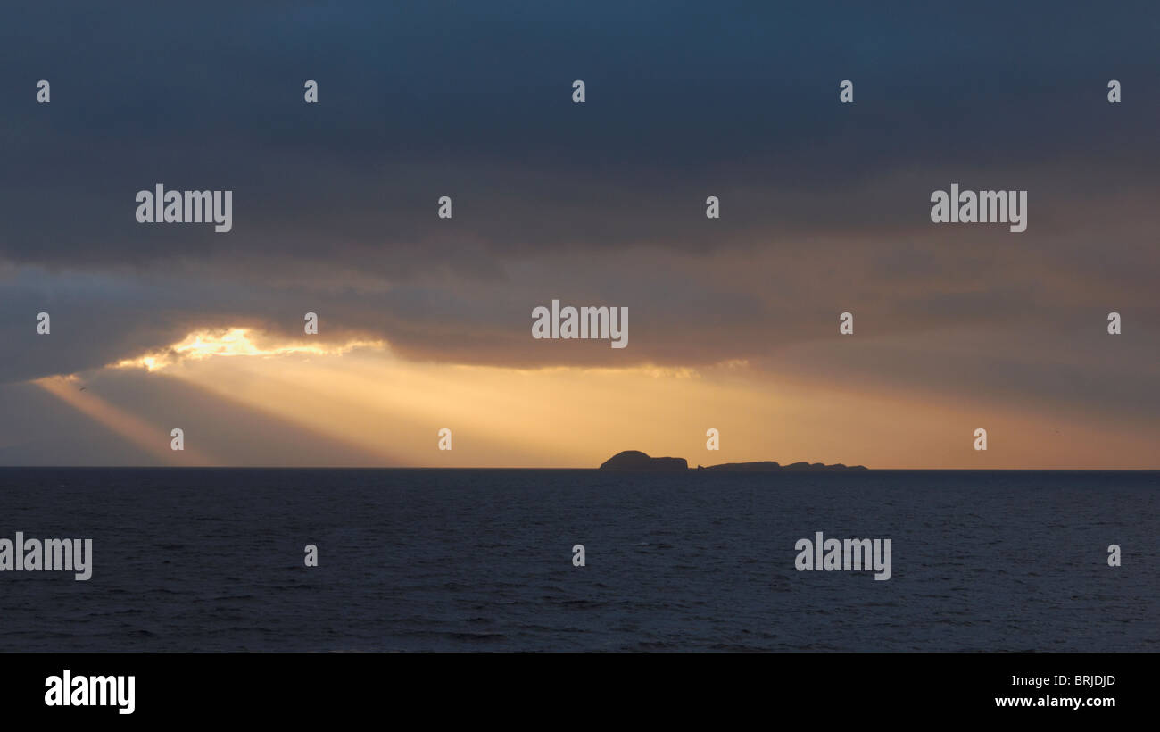 Light shafts at sunset over the Outer Hebrides from the Isle of Skye ...