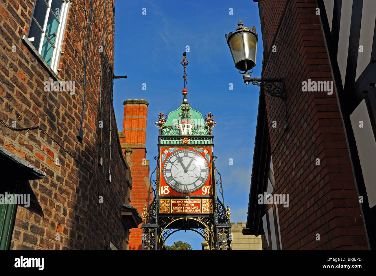 The famous old Victorian Eastgate clock on the Roman wall in Chester ...